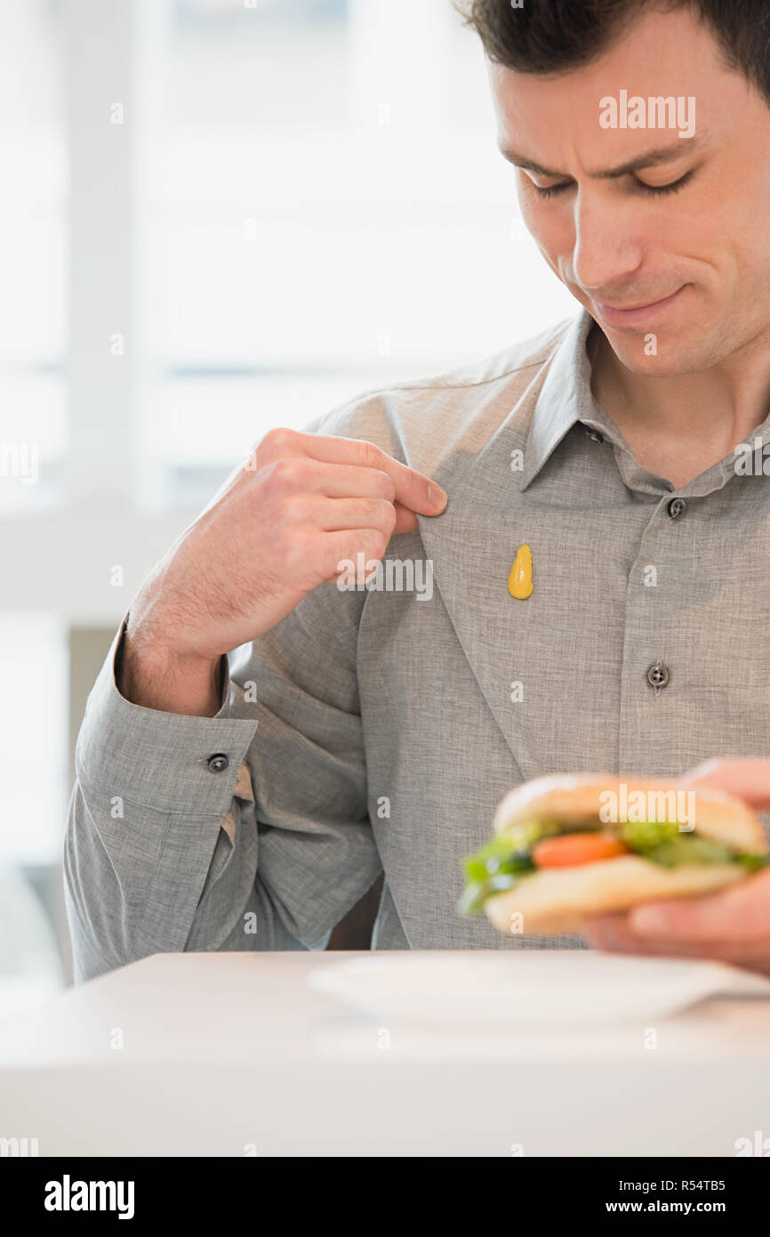 Man spilling burger hi-res stock photography and images - Alamy
