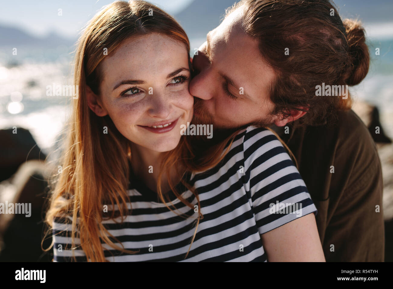 Woman being hugged hi-res stock photography and images - Alamy