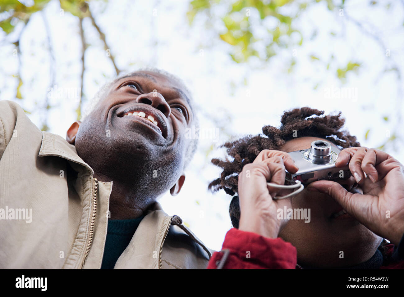 the couple using a camera Stock Photo - Alamy