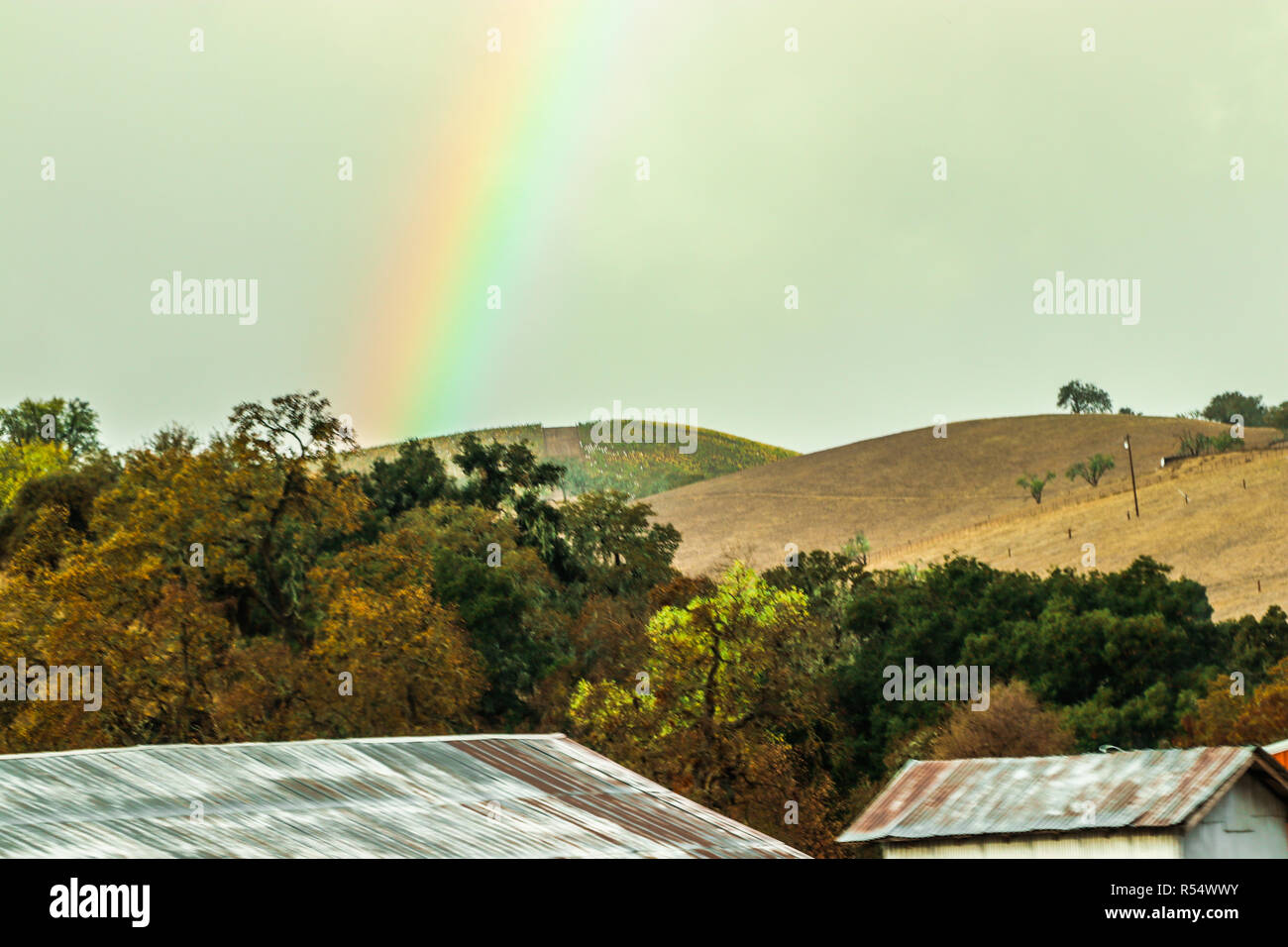 Autumn rainbow over vineyard and hills Stock Photo - Alamy