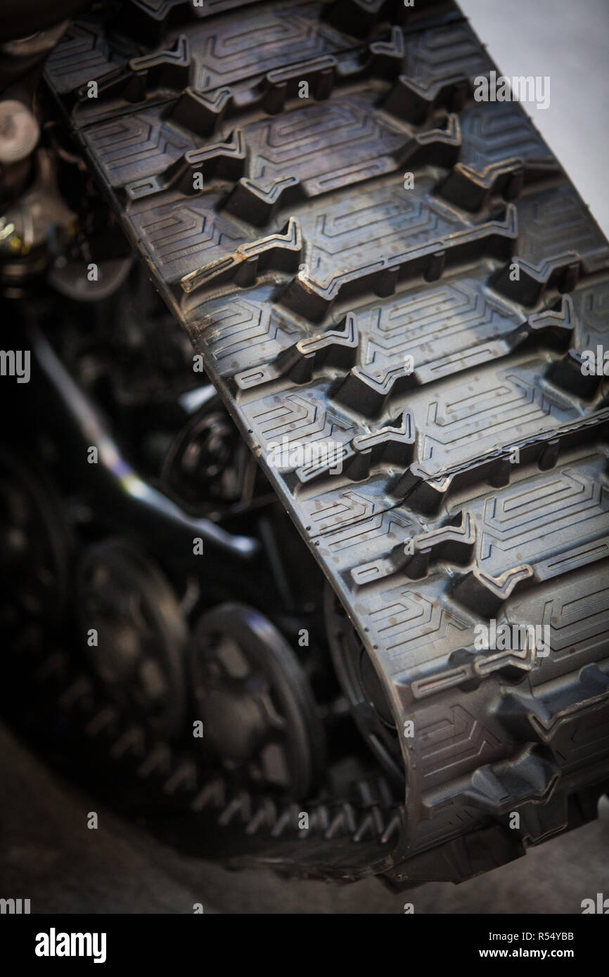 Color close up of a rubber caterpillar track Stock Photo - Alamy