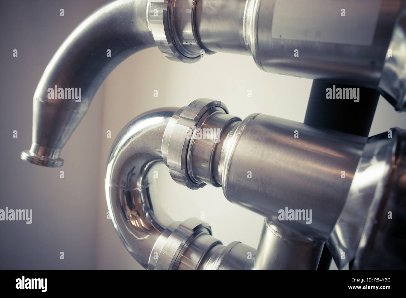 Some stainless steel pipes in a wine factory Stock Photo - Alamy