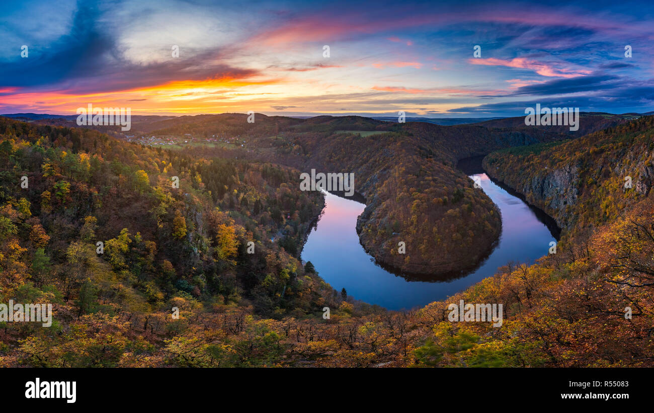 Panoramic view of river canyon with dark water and autumn colorful ...