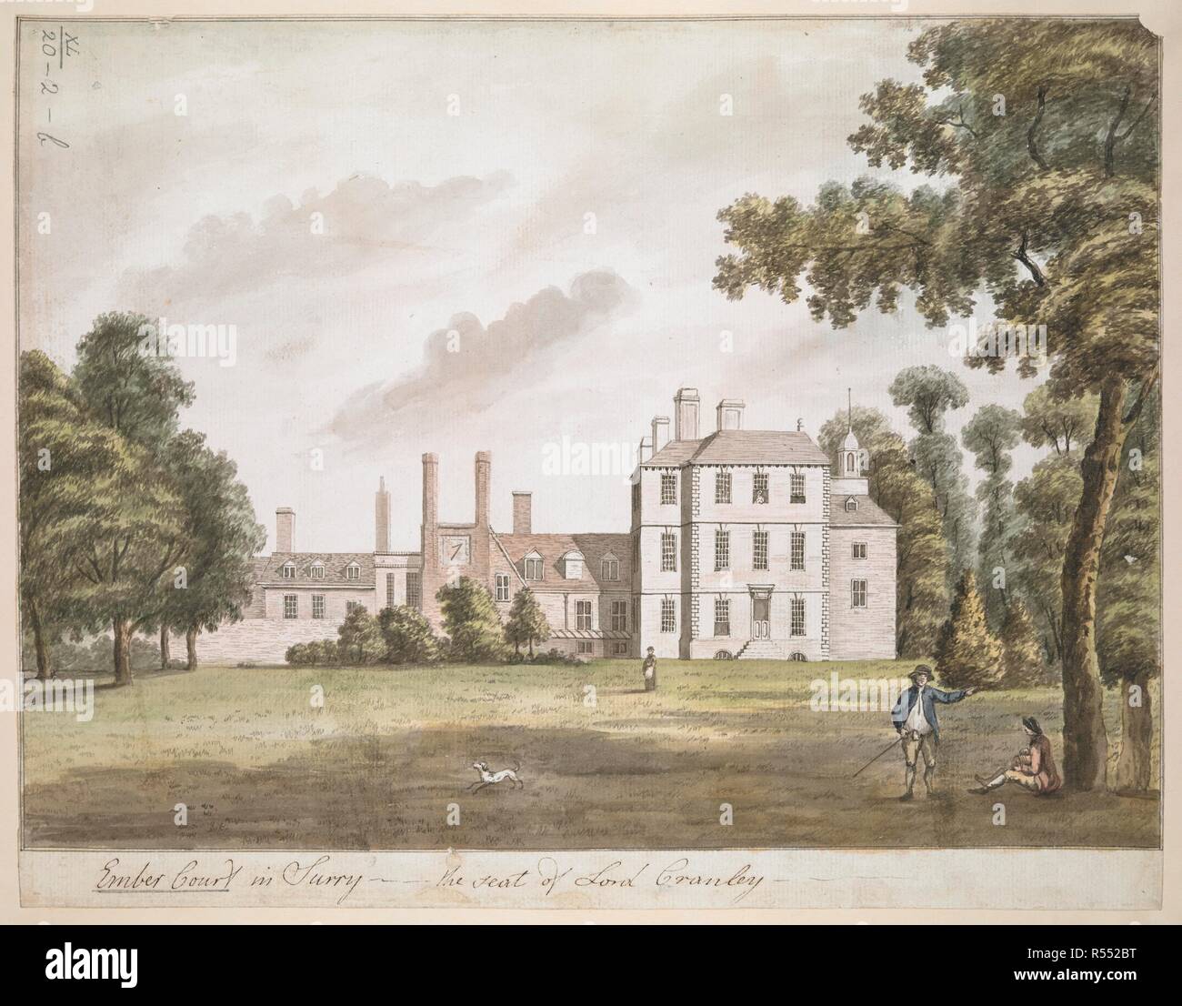 Two figures and a dog on a lawn; Ember Court in the middle ground ...