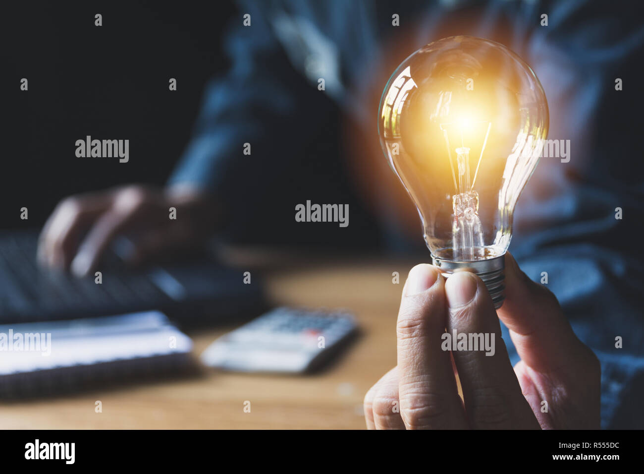 Close up hand holding table lamp hi-res stock photography and images ...
