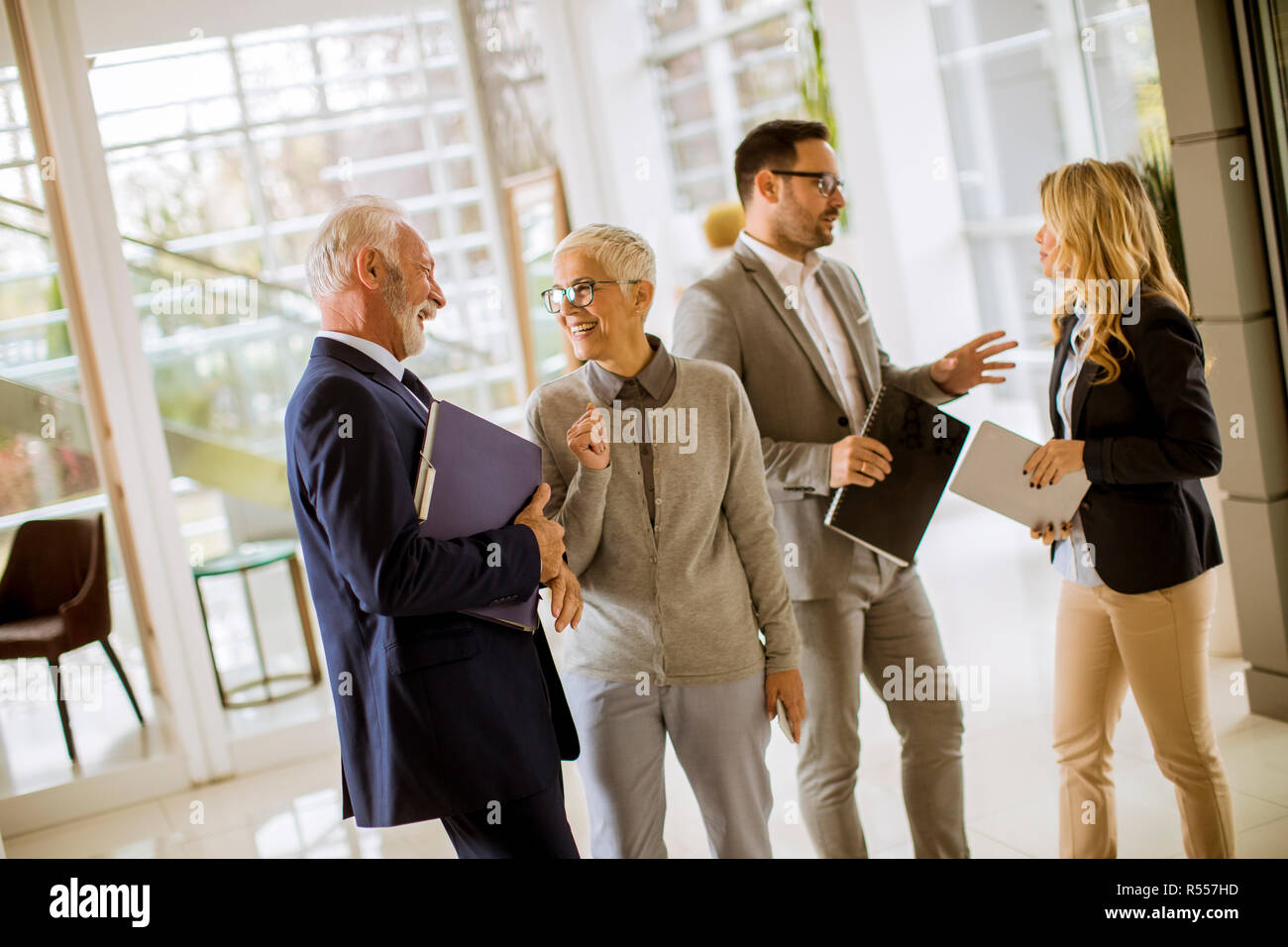 Leadership smiling communication standing hi-res stock photography and images - Alamy