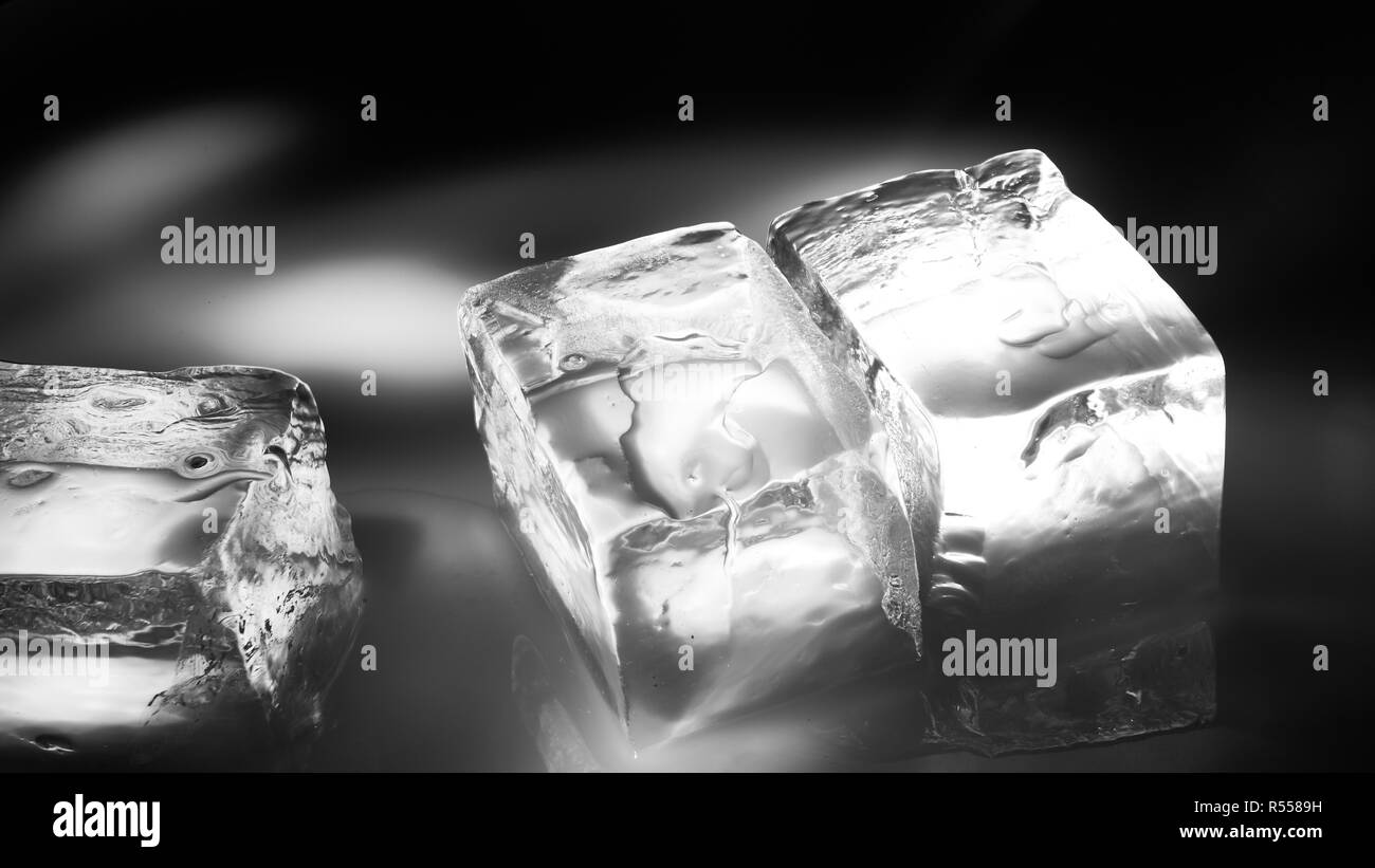 Pieces of crushed ice cubes on black background Stock Photo - Alamy