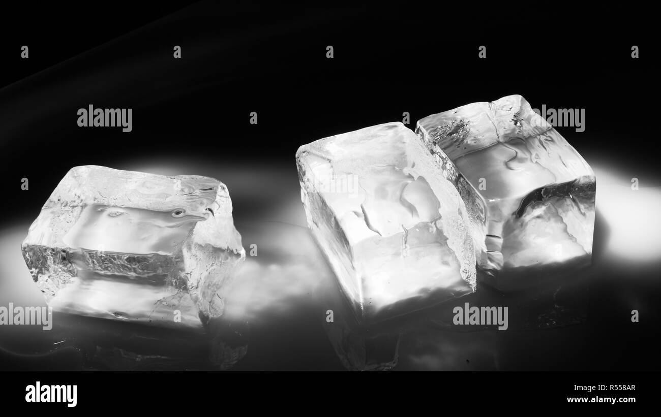 Pieces of crushed ice cubes on black background Stock Photo - Alamy
