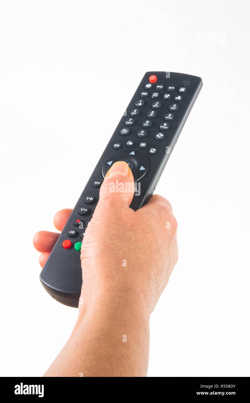 hand holding a remote control on white background Stock Photo - Alamy