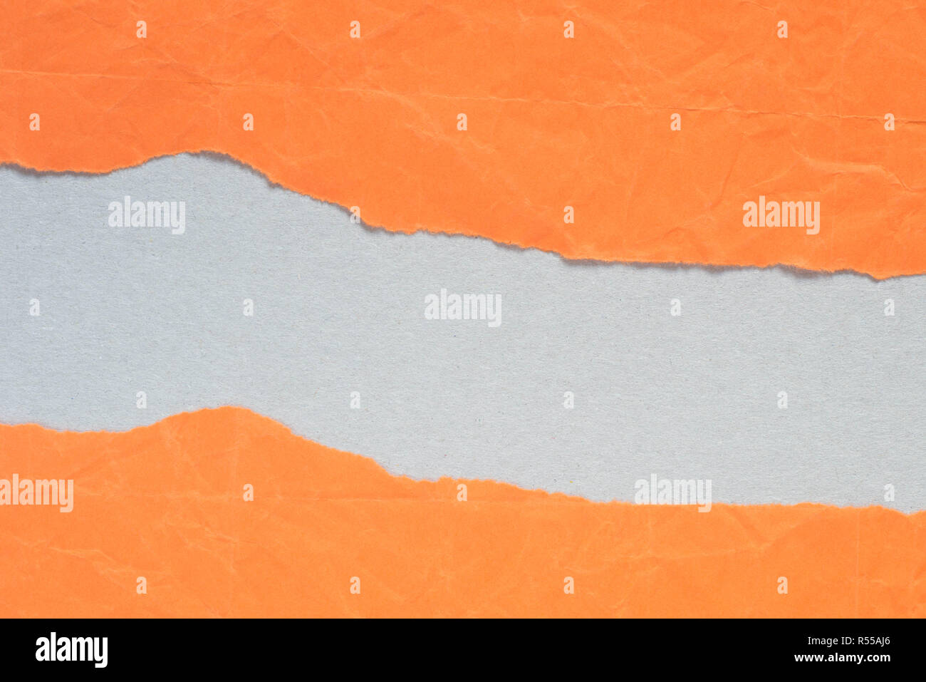 orange torn paper with copy space on gray background texture Stock ...