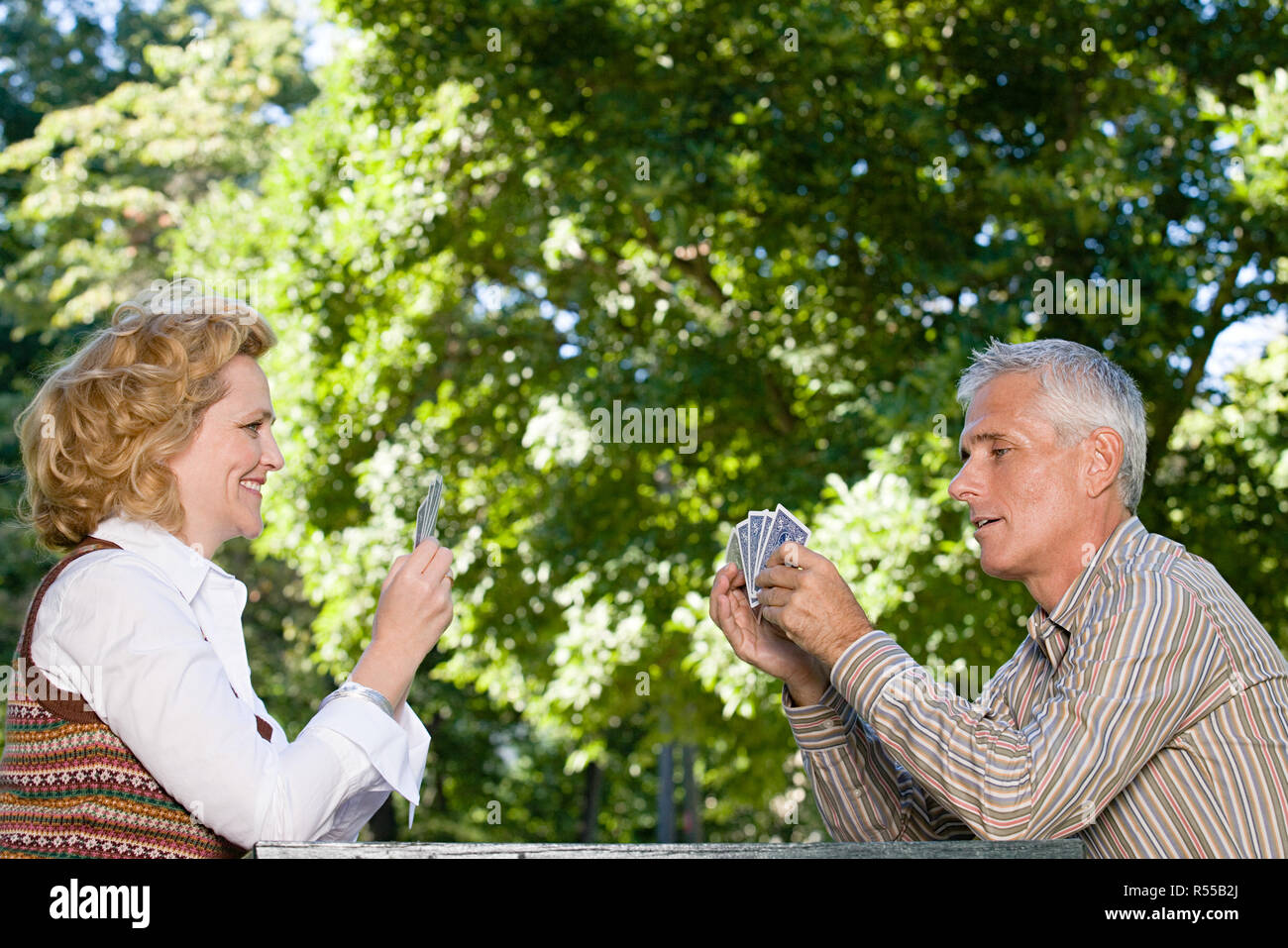 Couple playing cards Stock Photo - Alamy