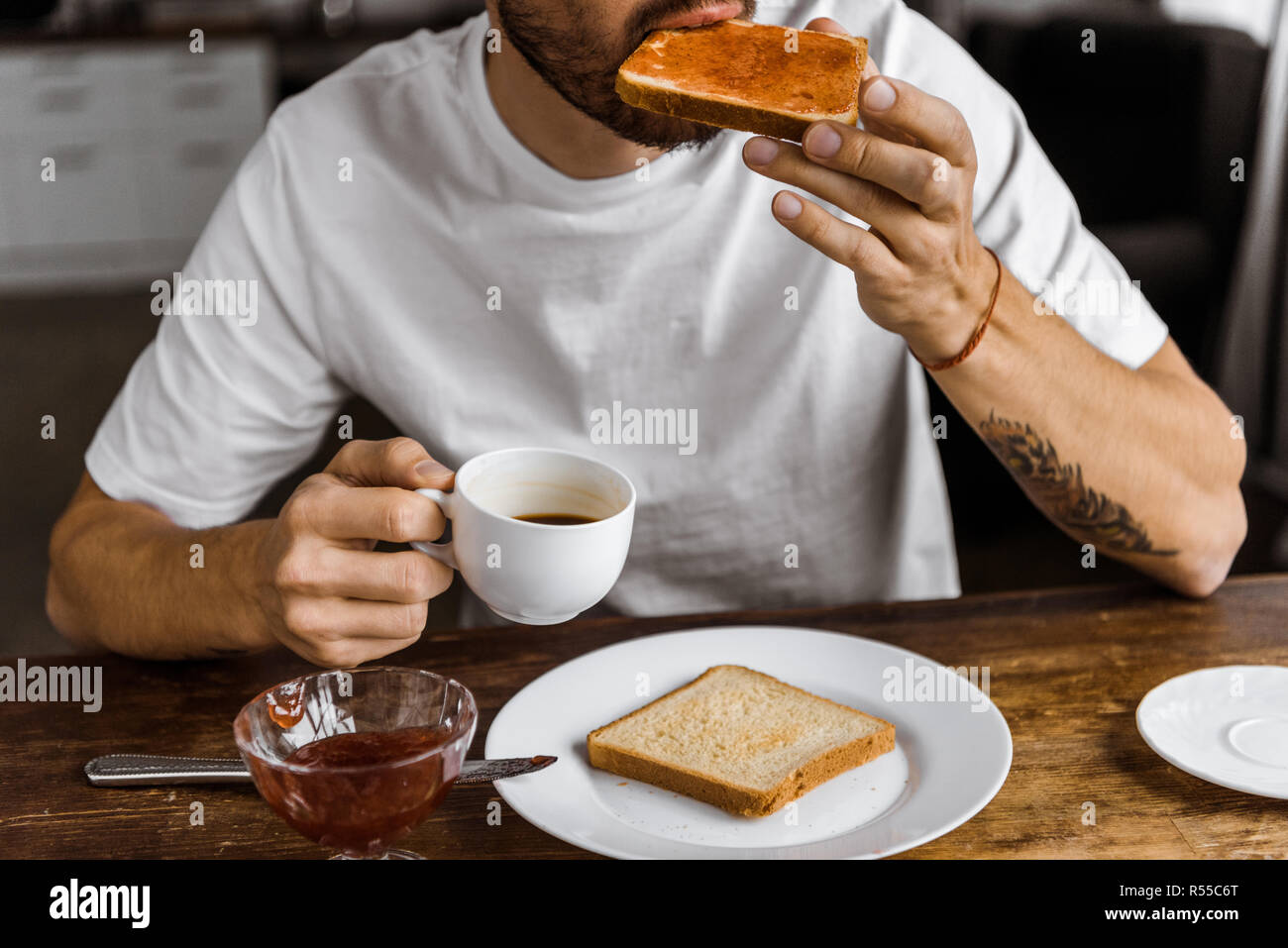 Person eating toast hi-res stock photography and images - Alamy