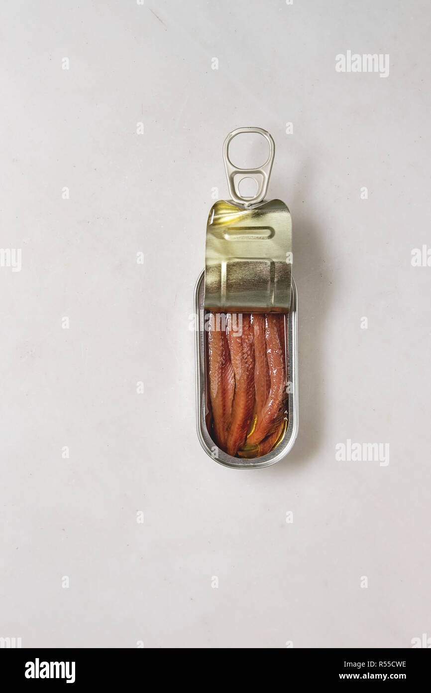 Pickled anchovies in tin can Stock Photo - Alamy