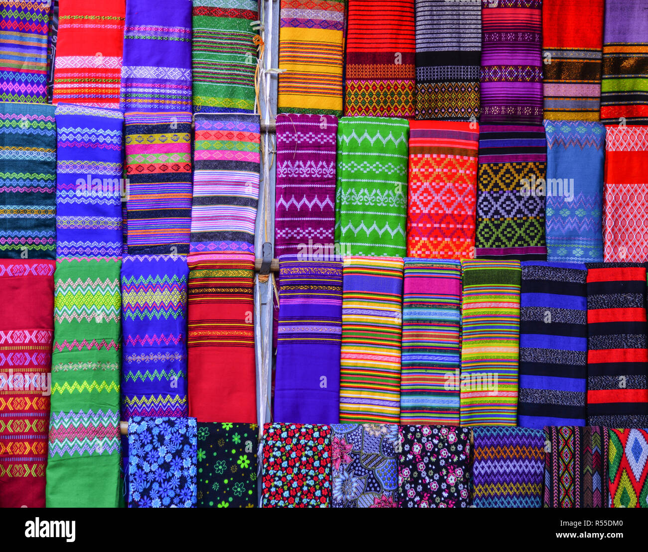Colorful textile for sale at street market in Yangon, Myanmar Stock ...