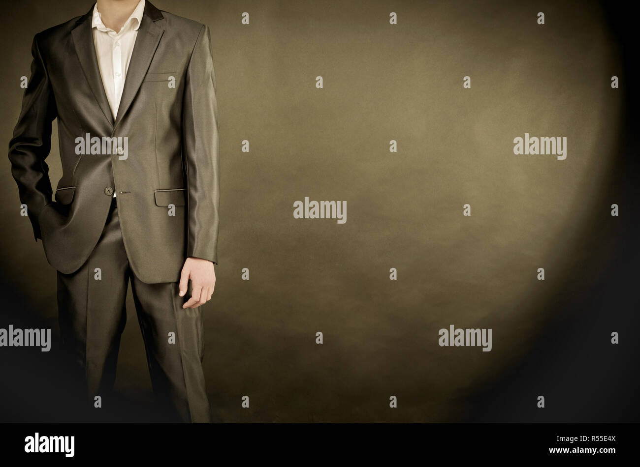 man in suit on a black background Stock Photo - Alamy