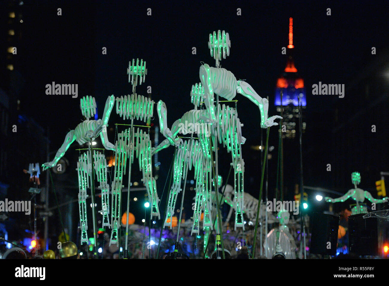 People in costumes participate in the annual Village Halloween parade ...