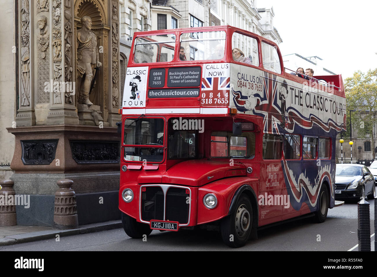 Classic London Tour Bus, Traveling past a statue of Edward, Prince of ...