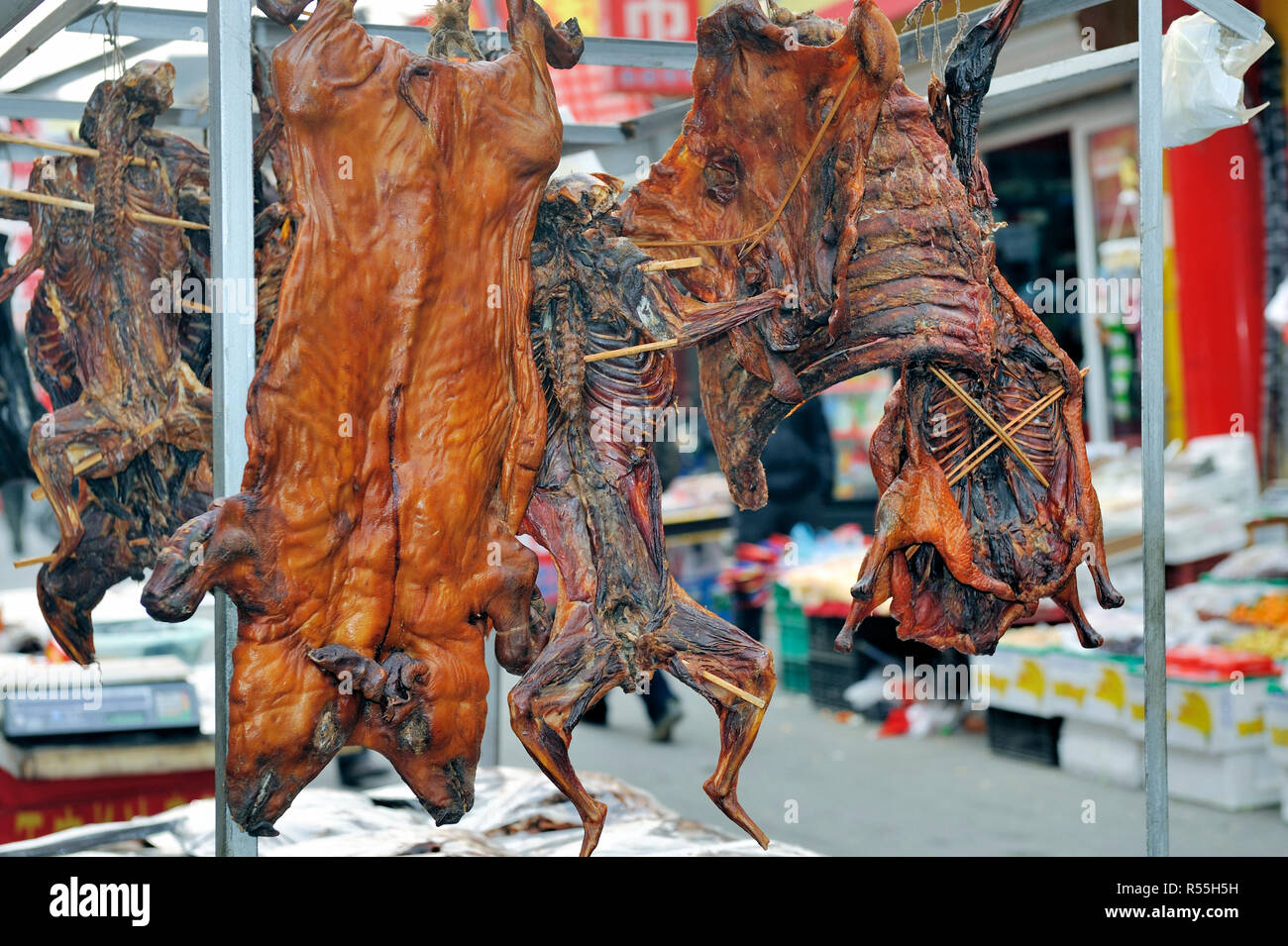 Butcher shop with various meats as Peking duck,chicken,pig in Beijing ...