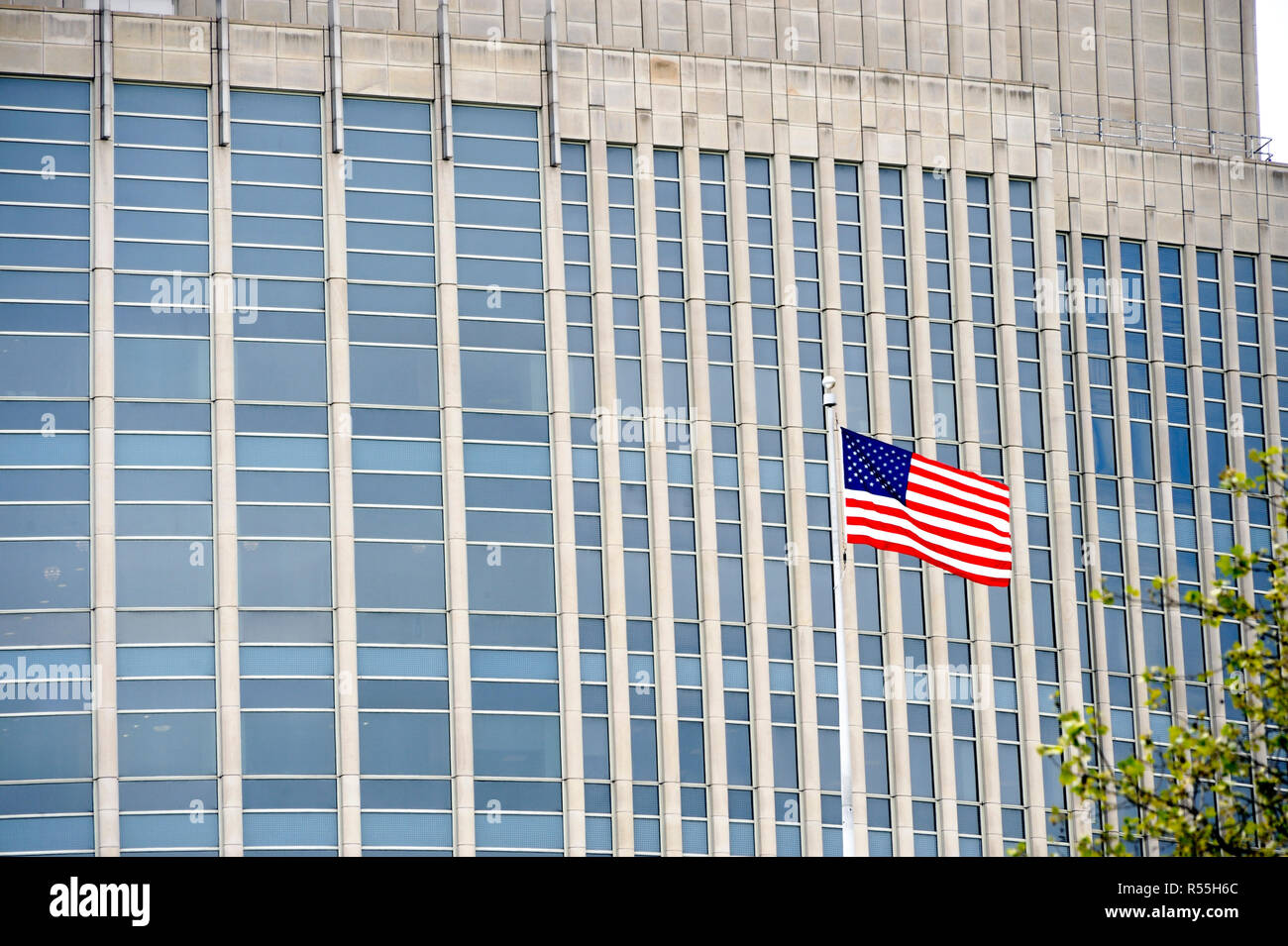 American flag in front of an office building in New York Stock Photo ...