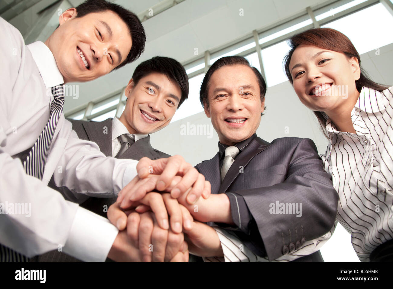 Business Team Making a Hand Pile Stock Photo - Alamy