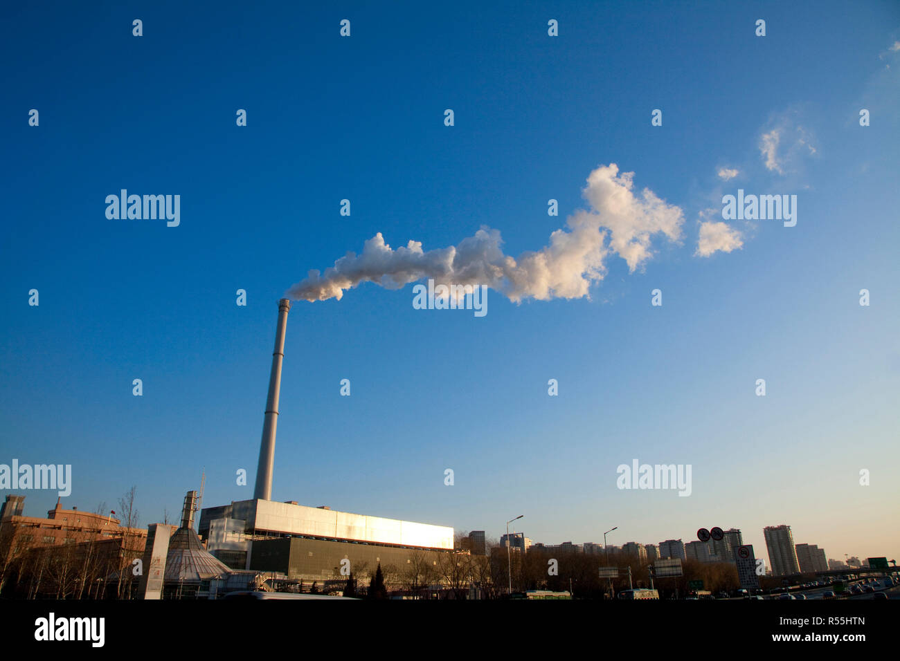 Smoke coming out of chimney Stock Photo - Alamy