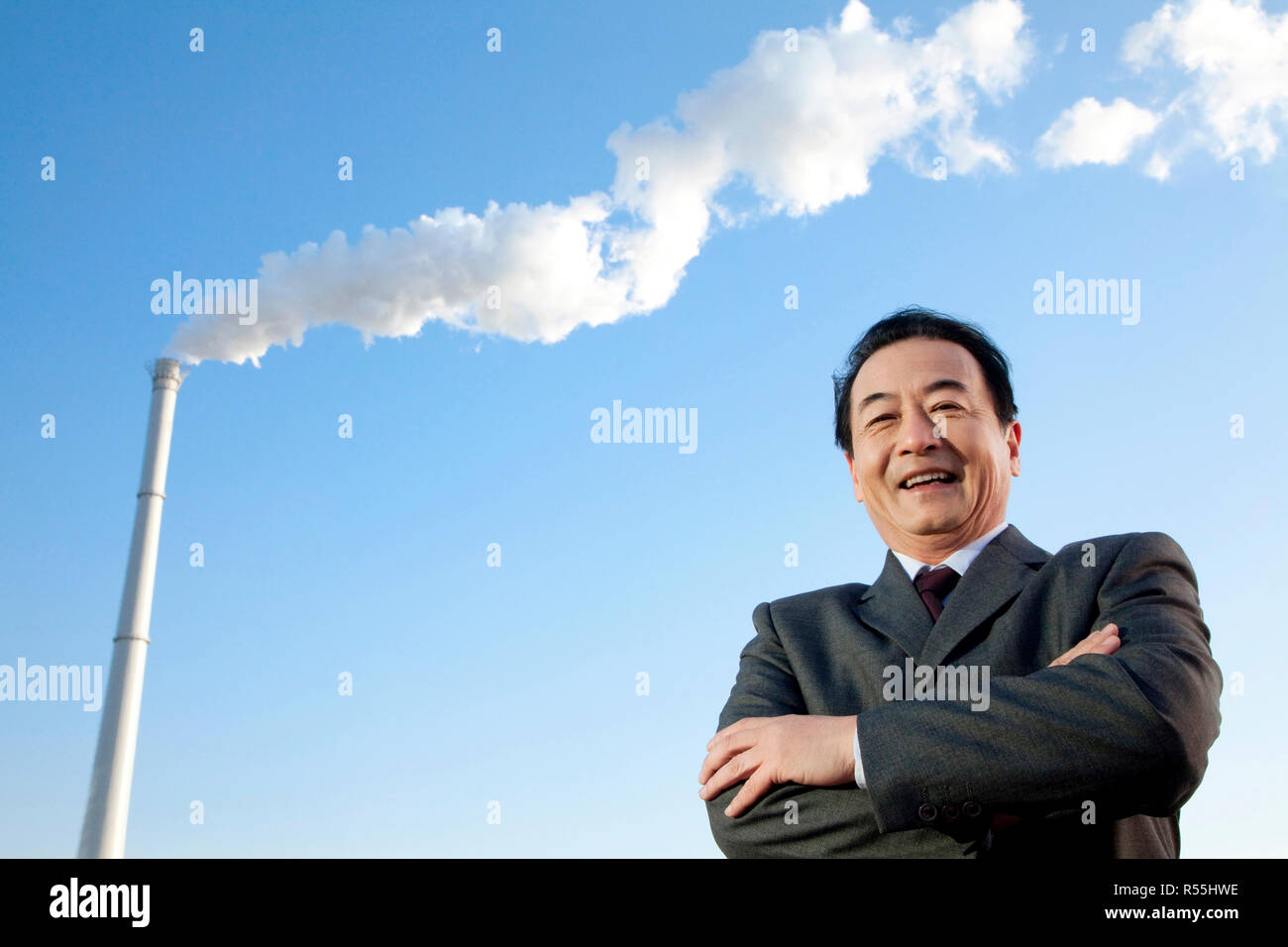 Chinese man in suit smoking hi-res stock photography and images - Alamy