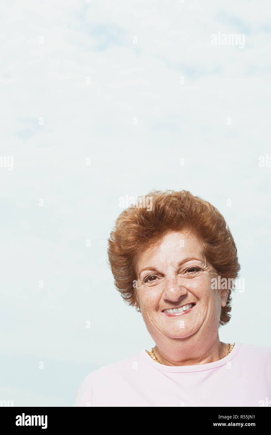 Senior woman smiling Stock Photo - Alamy