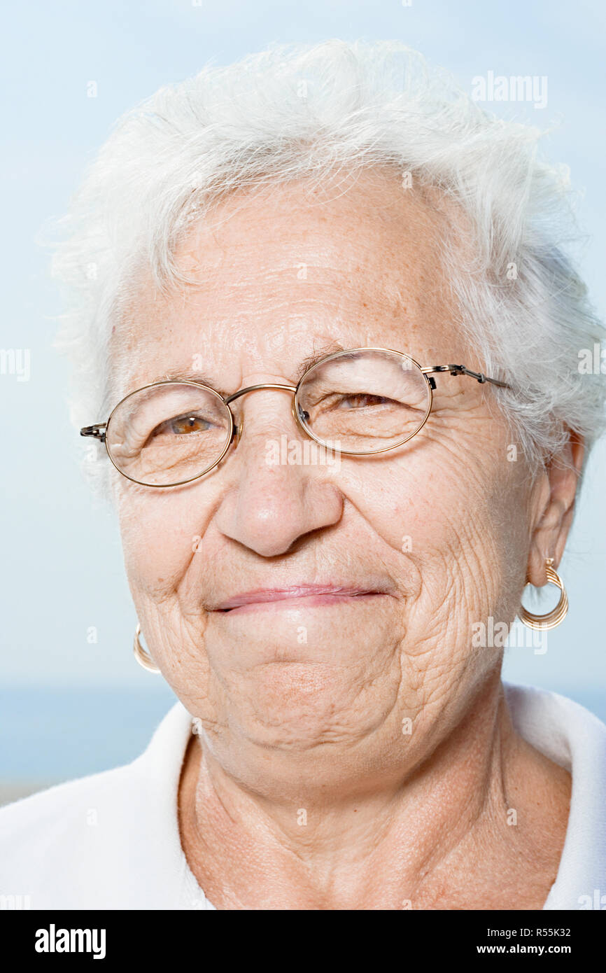 Senior woman smiling Stock Photo - Alamy