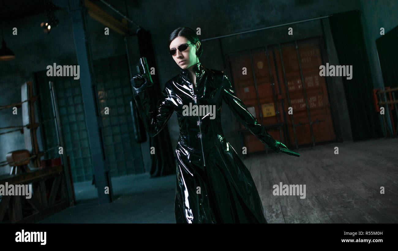 Computer viruses and cybersecurity, concept. young woman dressed in ...