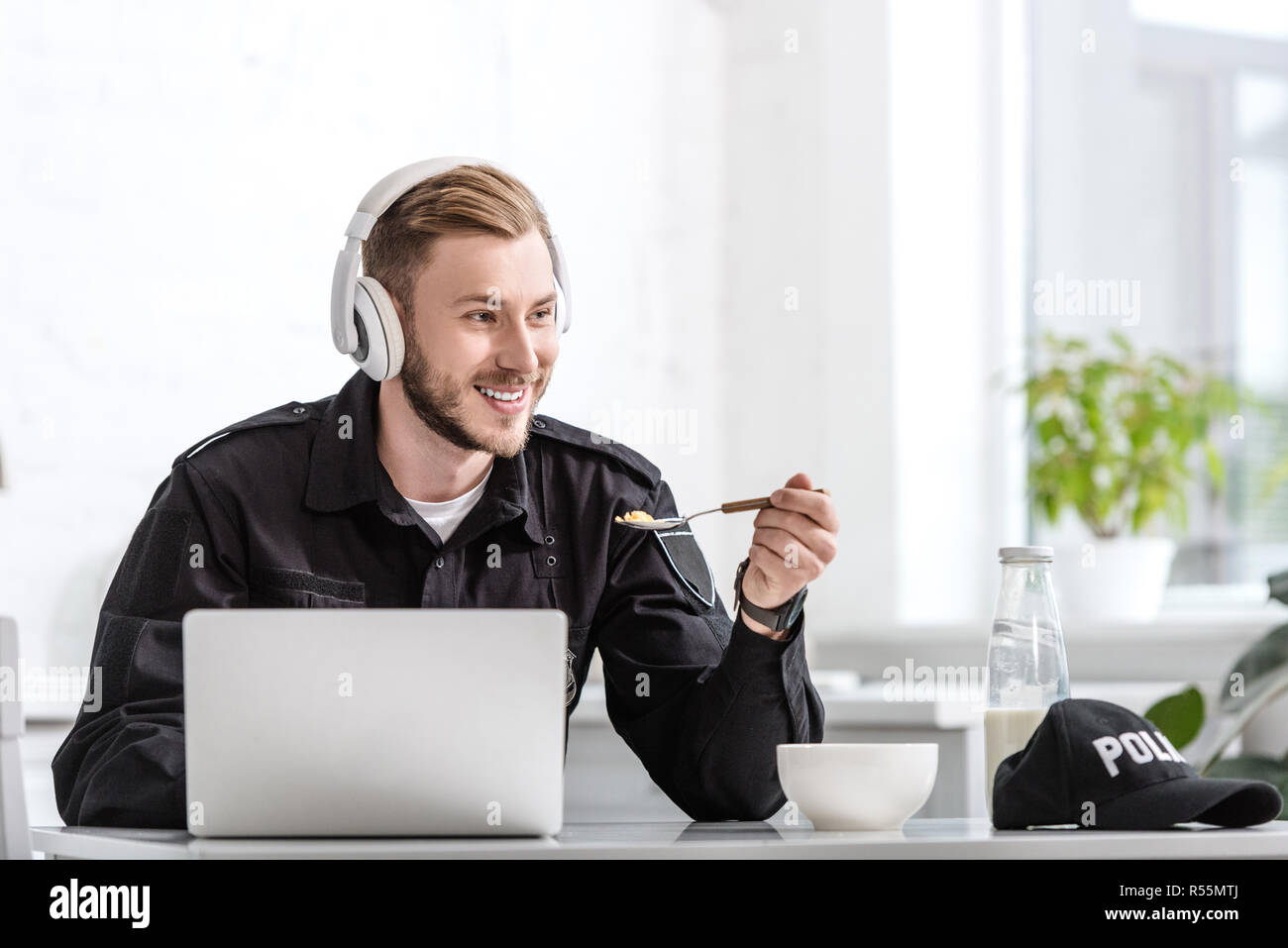 Police officer using equipment hi-res stock photography and images - Alamy