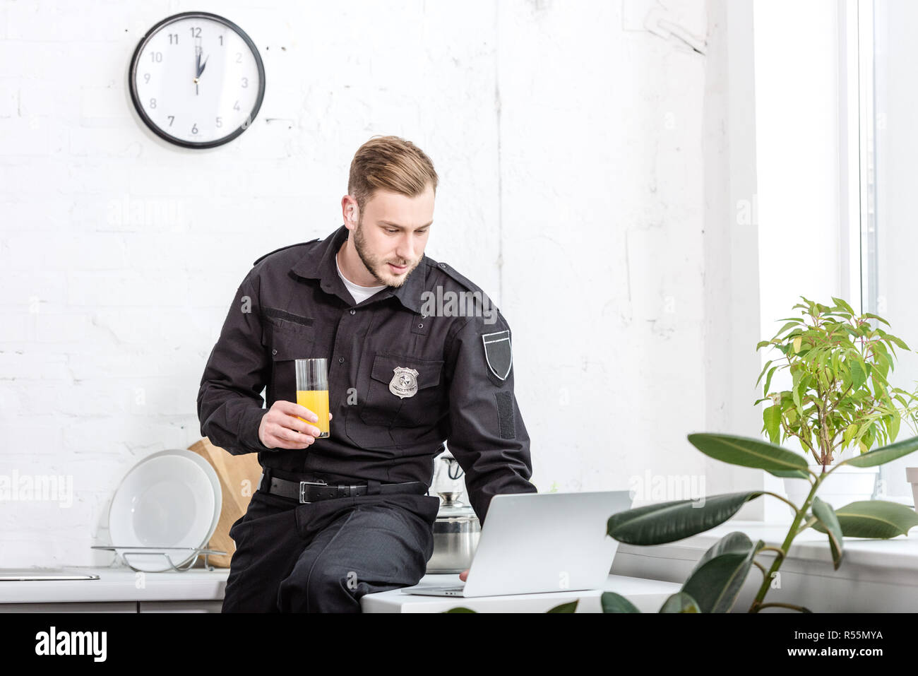 Communication sitting police officer uniform hi-res stock photography ...