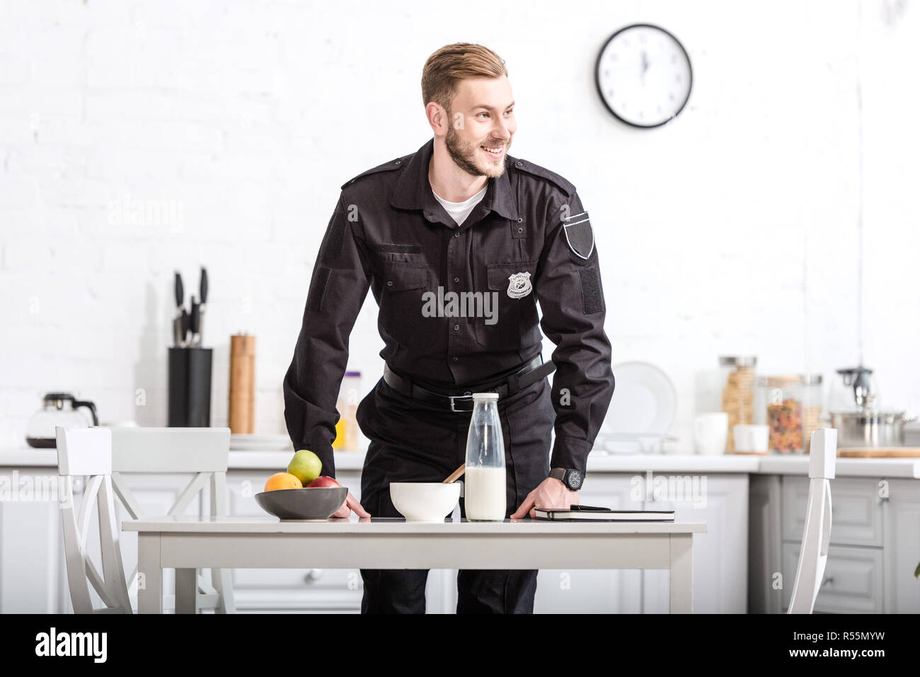 Person standing next table hi-res stock photography and images - Alamy