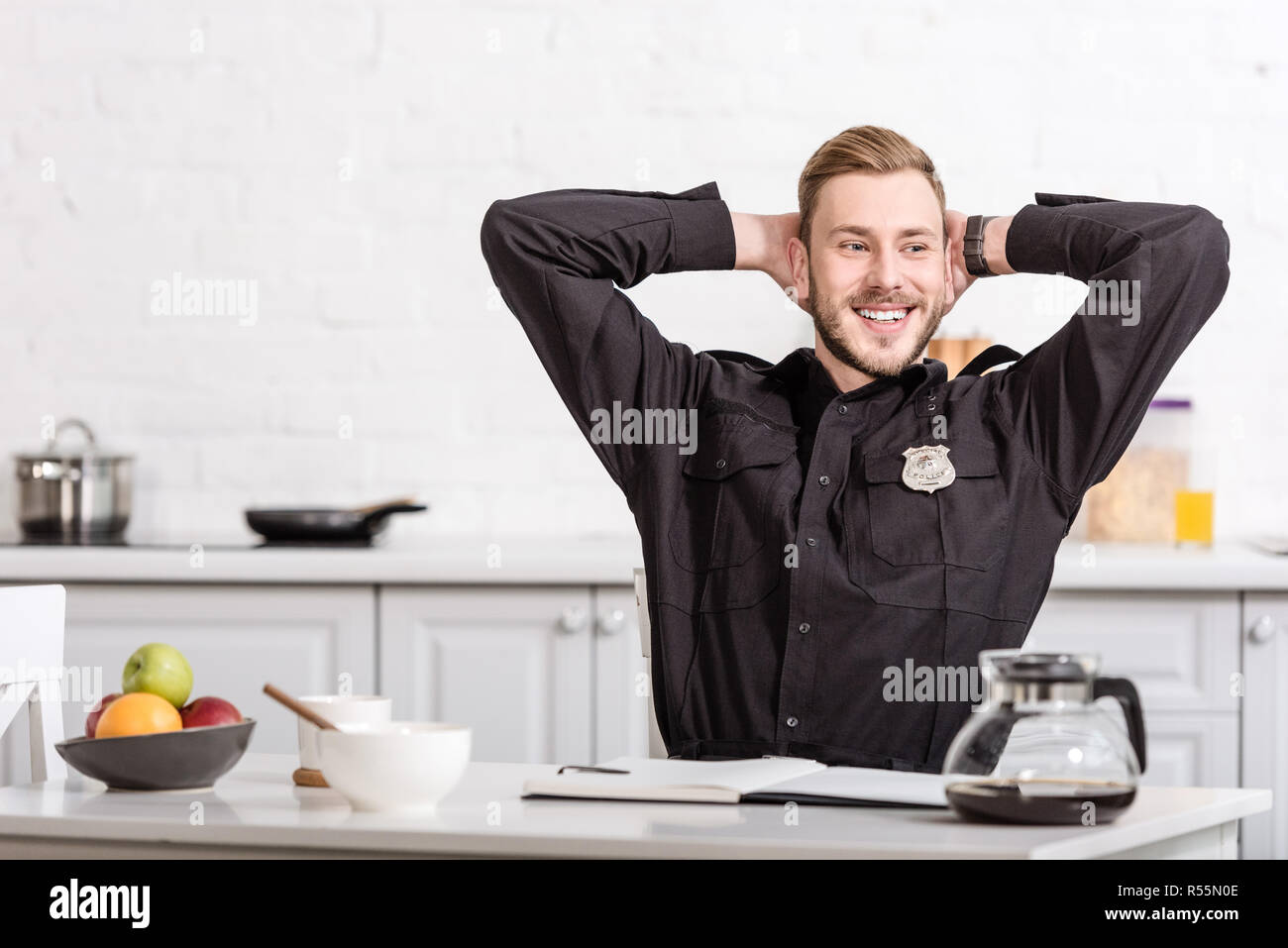 Smiling police officer hi-res stock photography and images - Alamy
