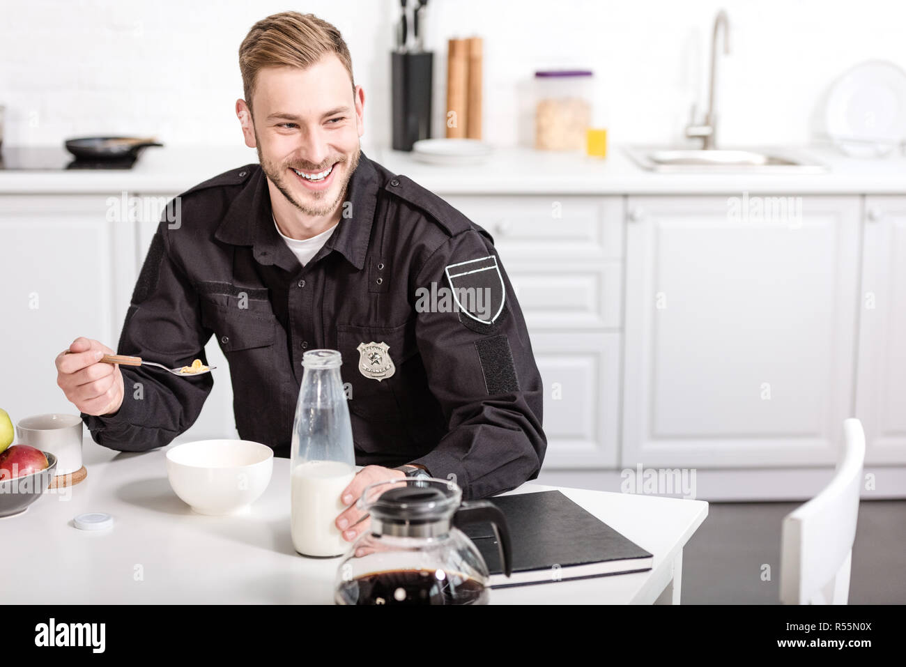 Policeman eating food hi-res stock photography and images - Alamy