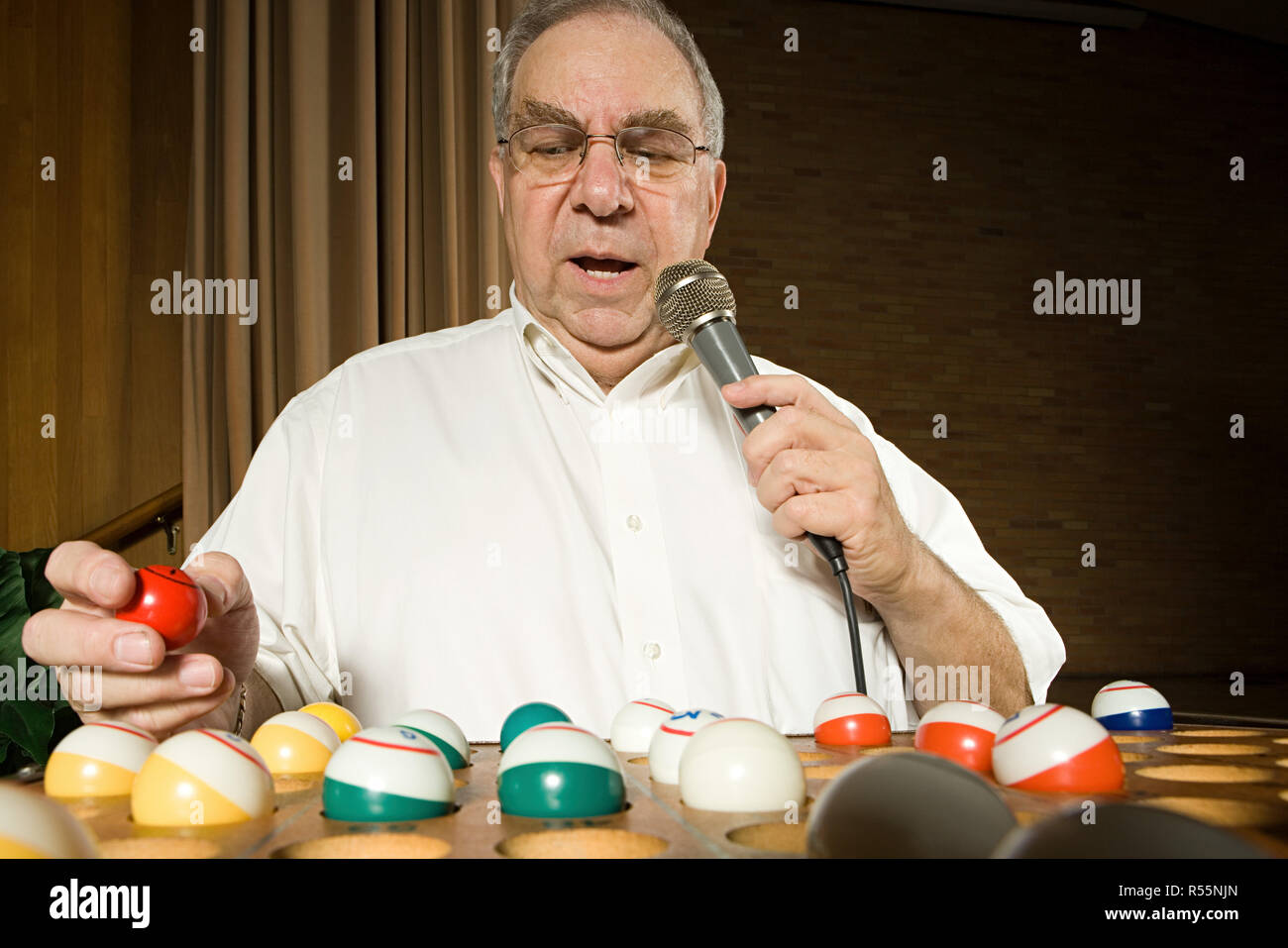 Bingo caller at work Stock Photo - Alamy