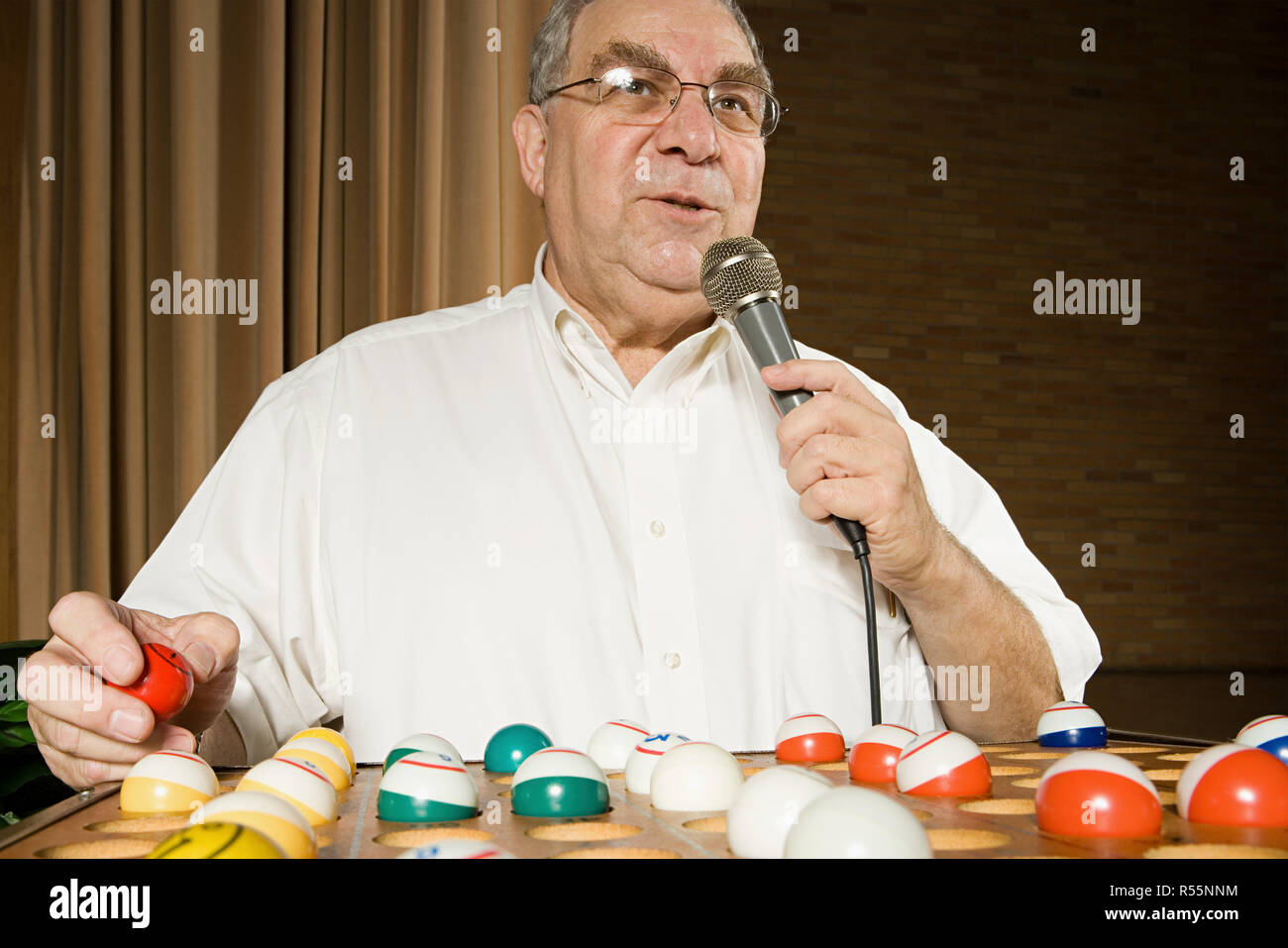 Bingo caller at work Stock Photo - Alamy
