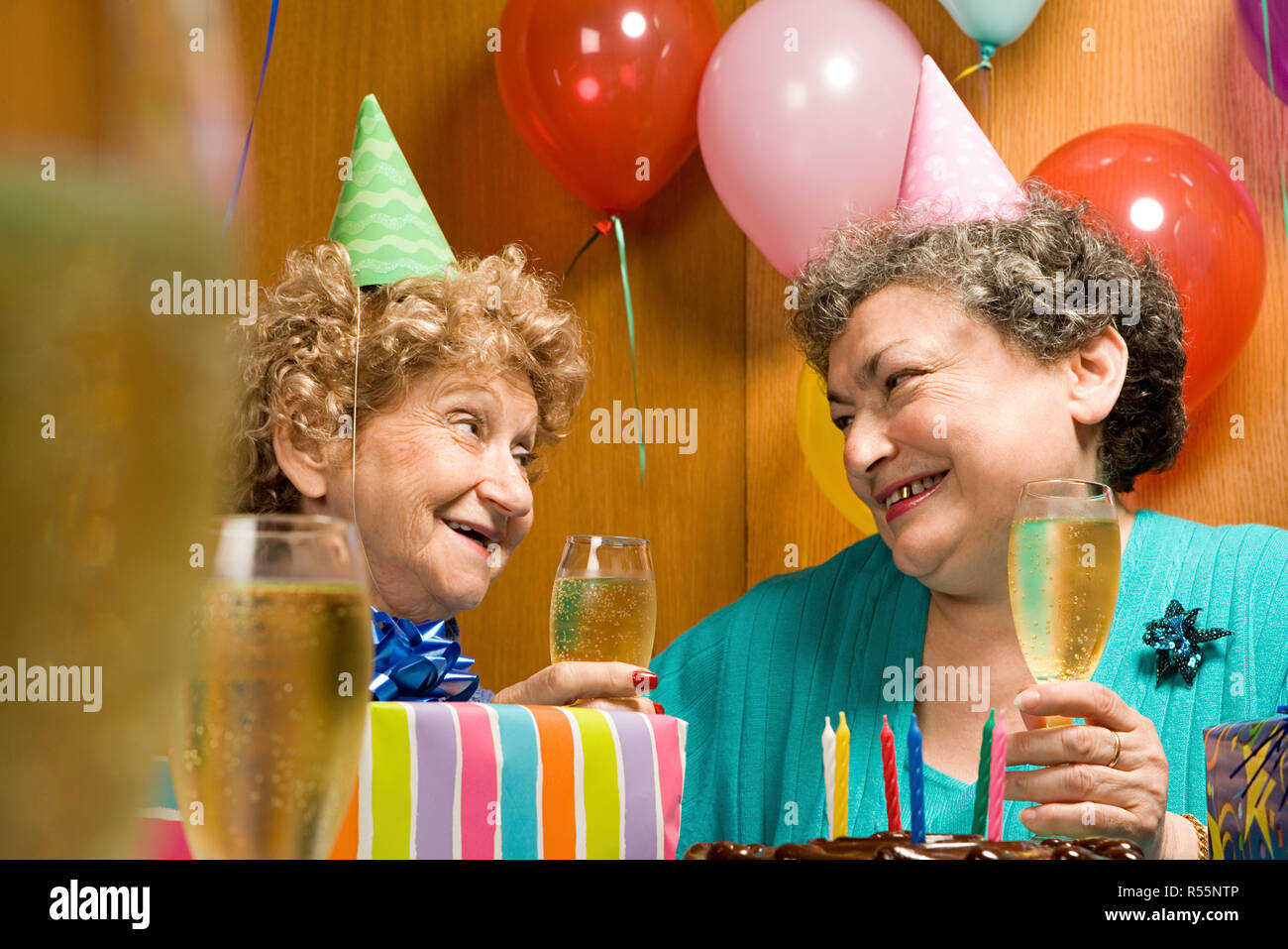 Two senior women at a party Stock Photo - Alamy