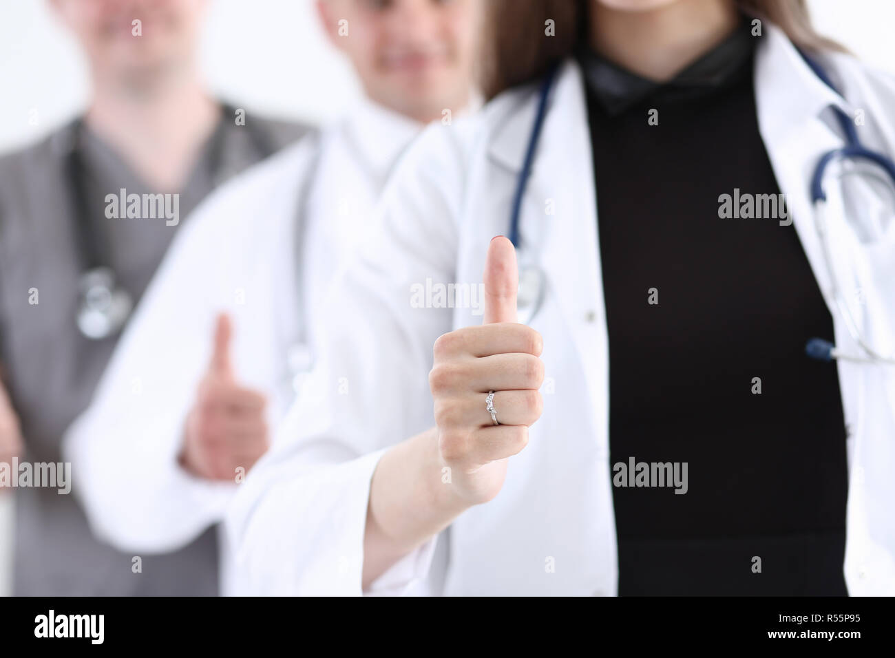 Group of doctor show OK or approval sign Stock Photo - Alamy