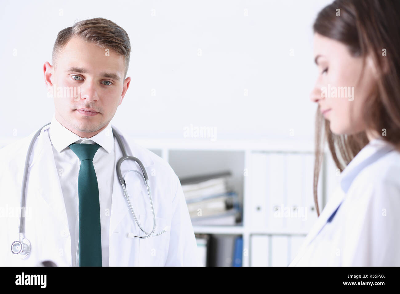 Group of medicine doctors talking during conference Stock Photo - Alamy