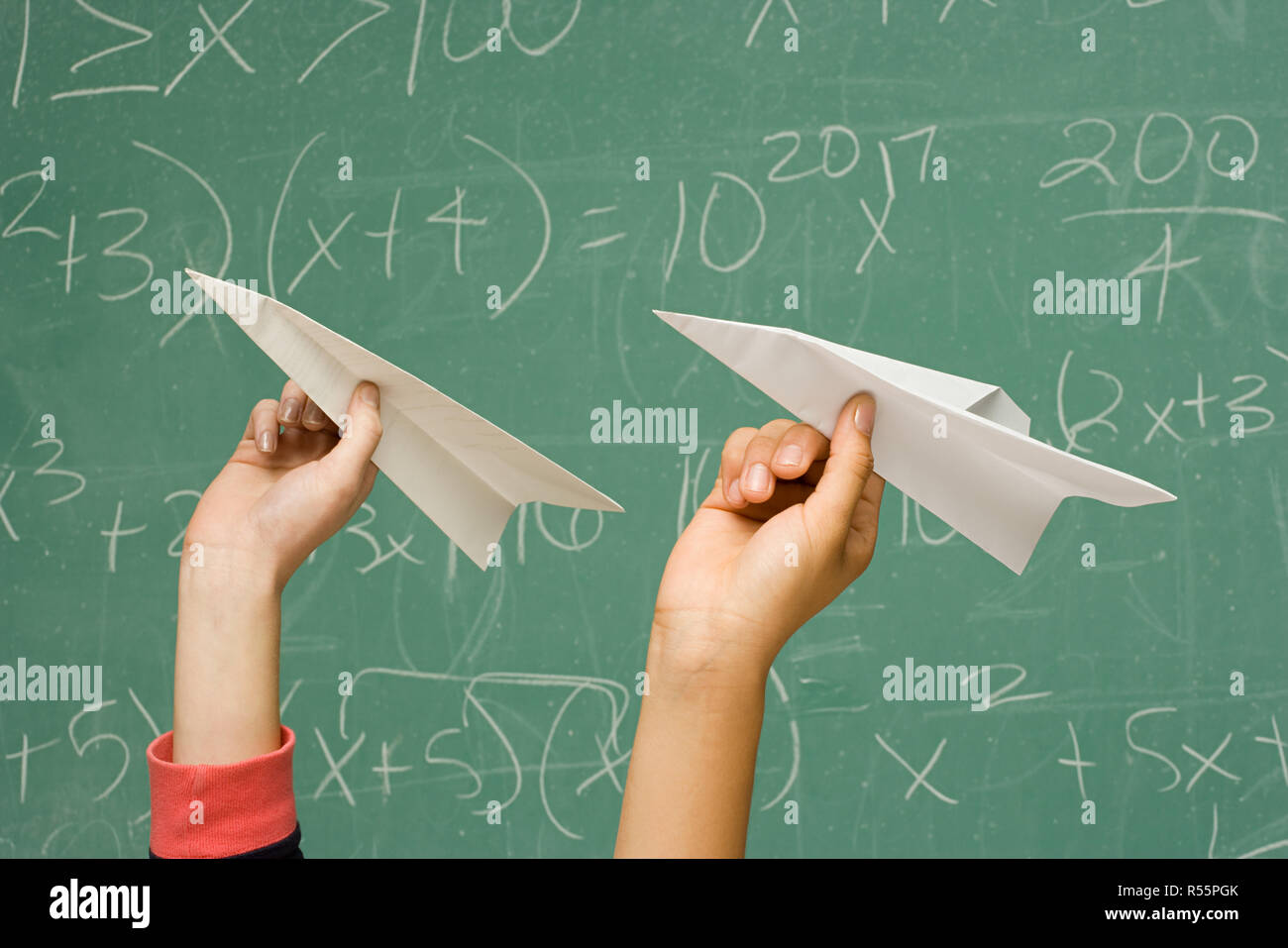 Students paper airplane classroom hi-res stock photography and images ...