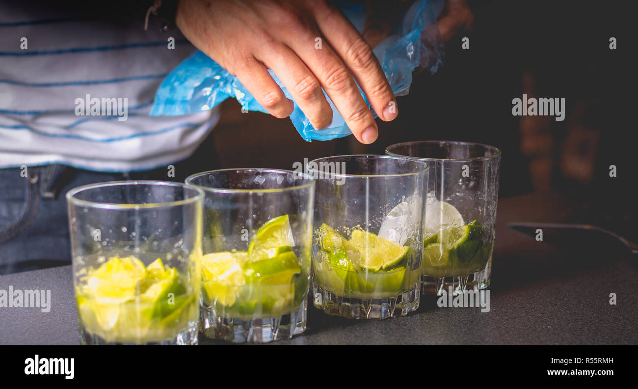 Barman puts ice cube in hi-res stock photography and images - Alamy