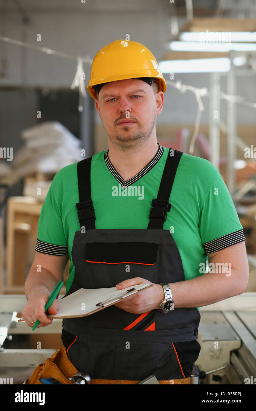 Portrait of young attractive man in work Stock Photo - Alamy