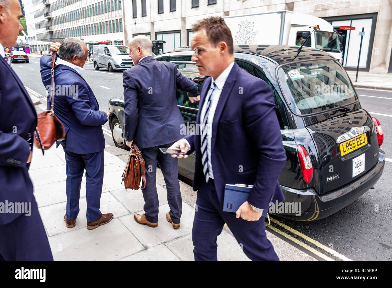 Taking A London Taxi High Resolution Stock Photography and Images - Alamy