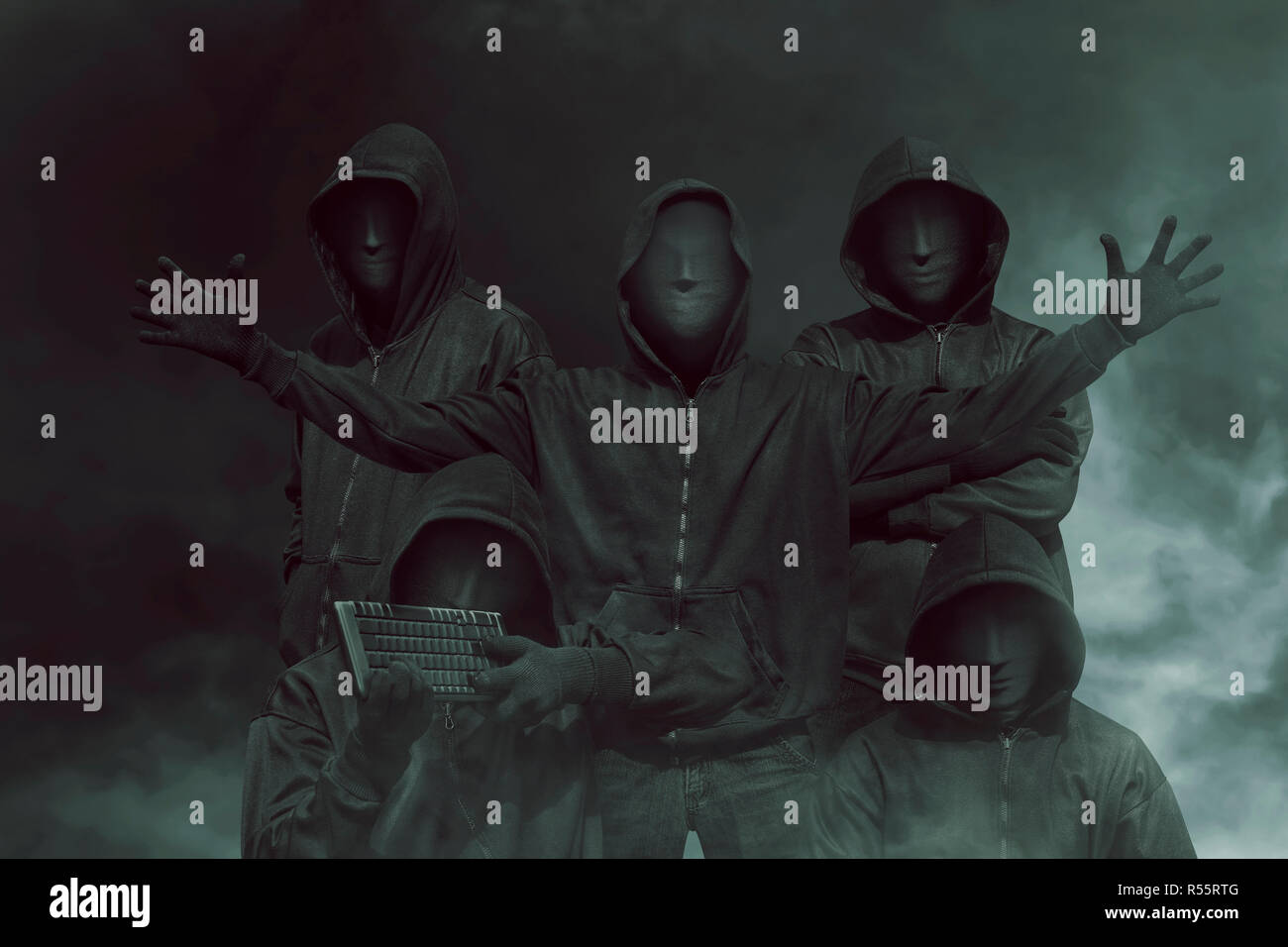 Hooded hacker in mask hi-res stock photography and images - Alamy