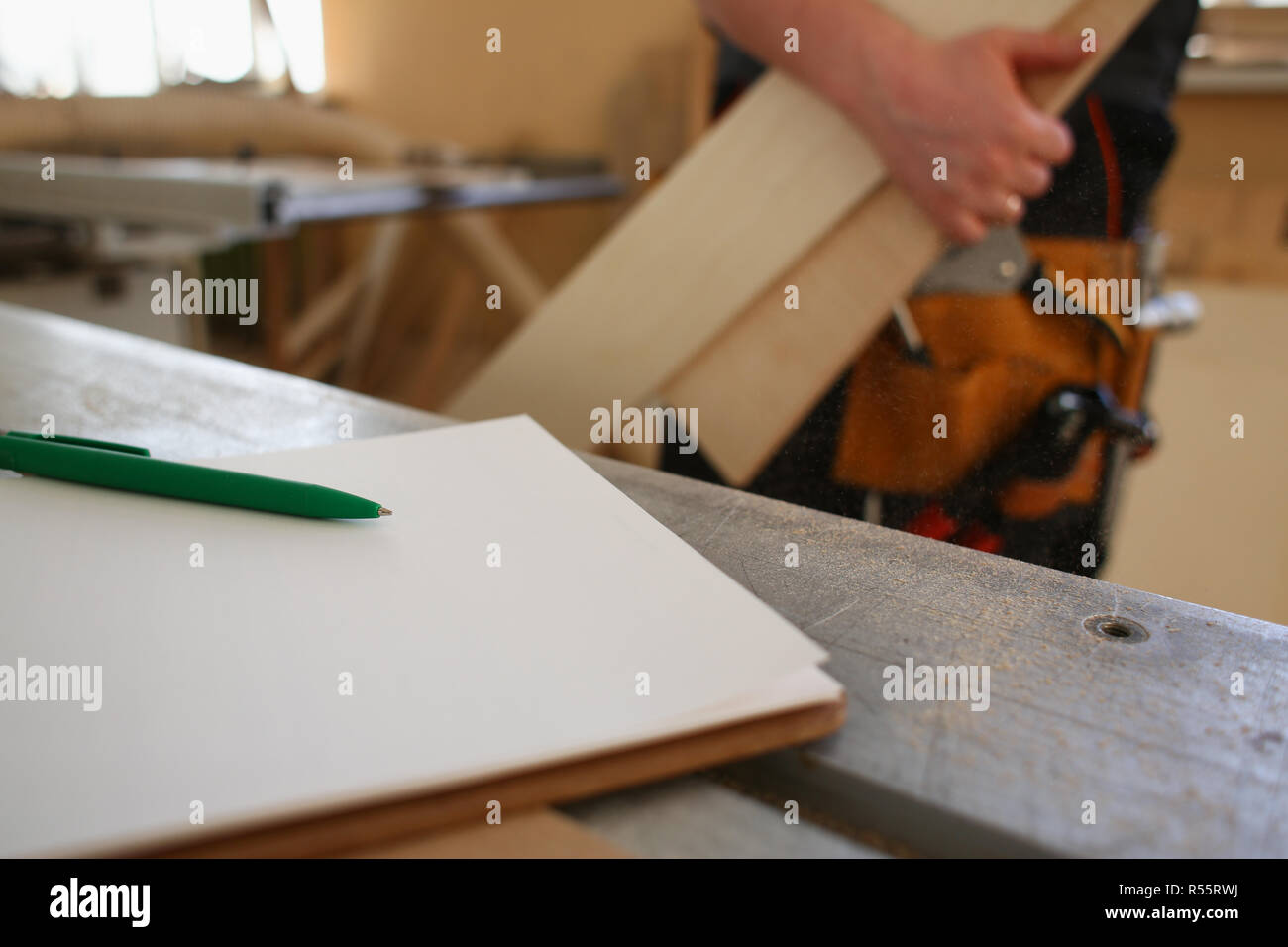 Drafting green pen lying on desk on clipboard Stock Photo - Alamy