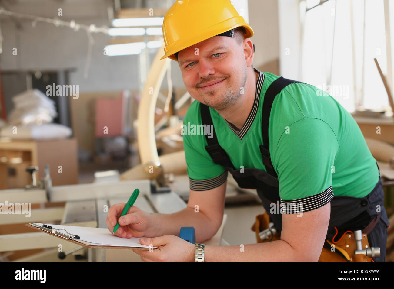 Portrait of young attractive man in work Stock Photo - Alamy