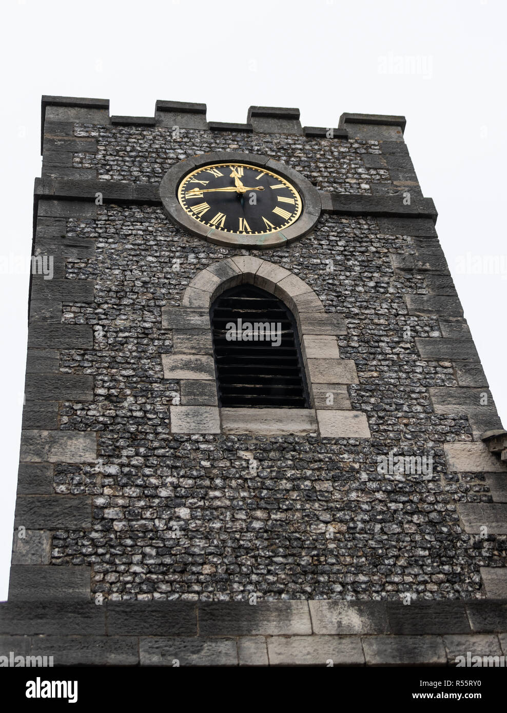 An ancient Clock Tower in Chichester East Gate Square Stock Photo - Alamy