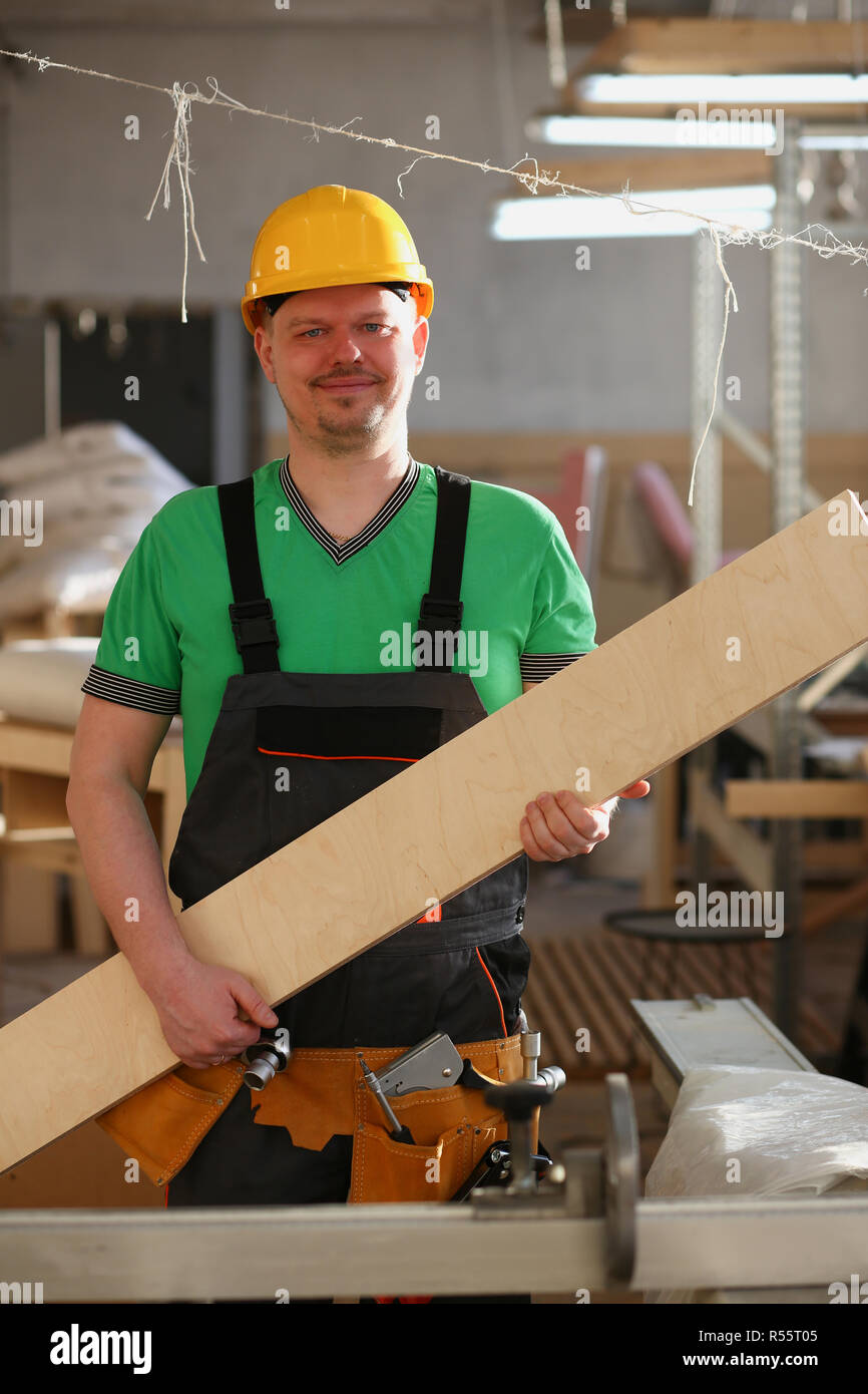 Portrait of a smiling carpenter Stock Photo - Alamy