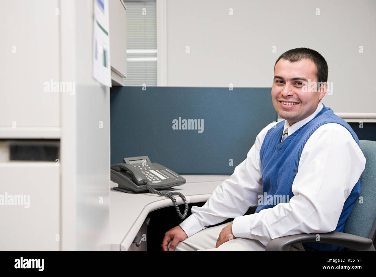 Office worker at his desk Stock Photo - Alamy