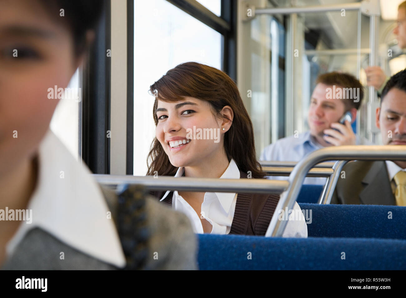 Happy commuters reading hi-res stock photography and images - Alamy